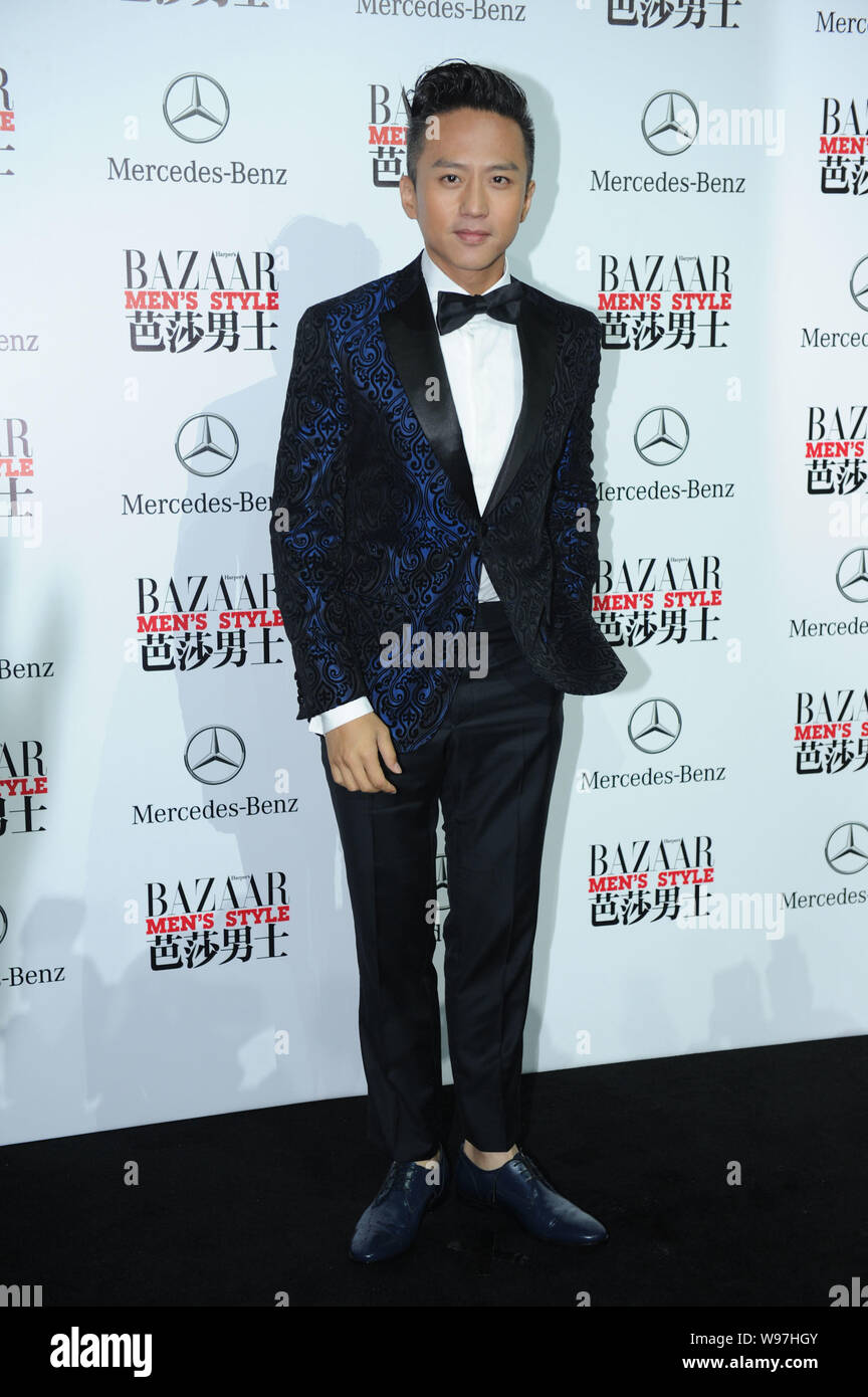 Chinese actor Deng Chao poses as he arrives for the award ceremony by ...