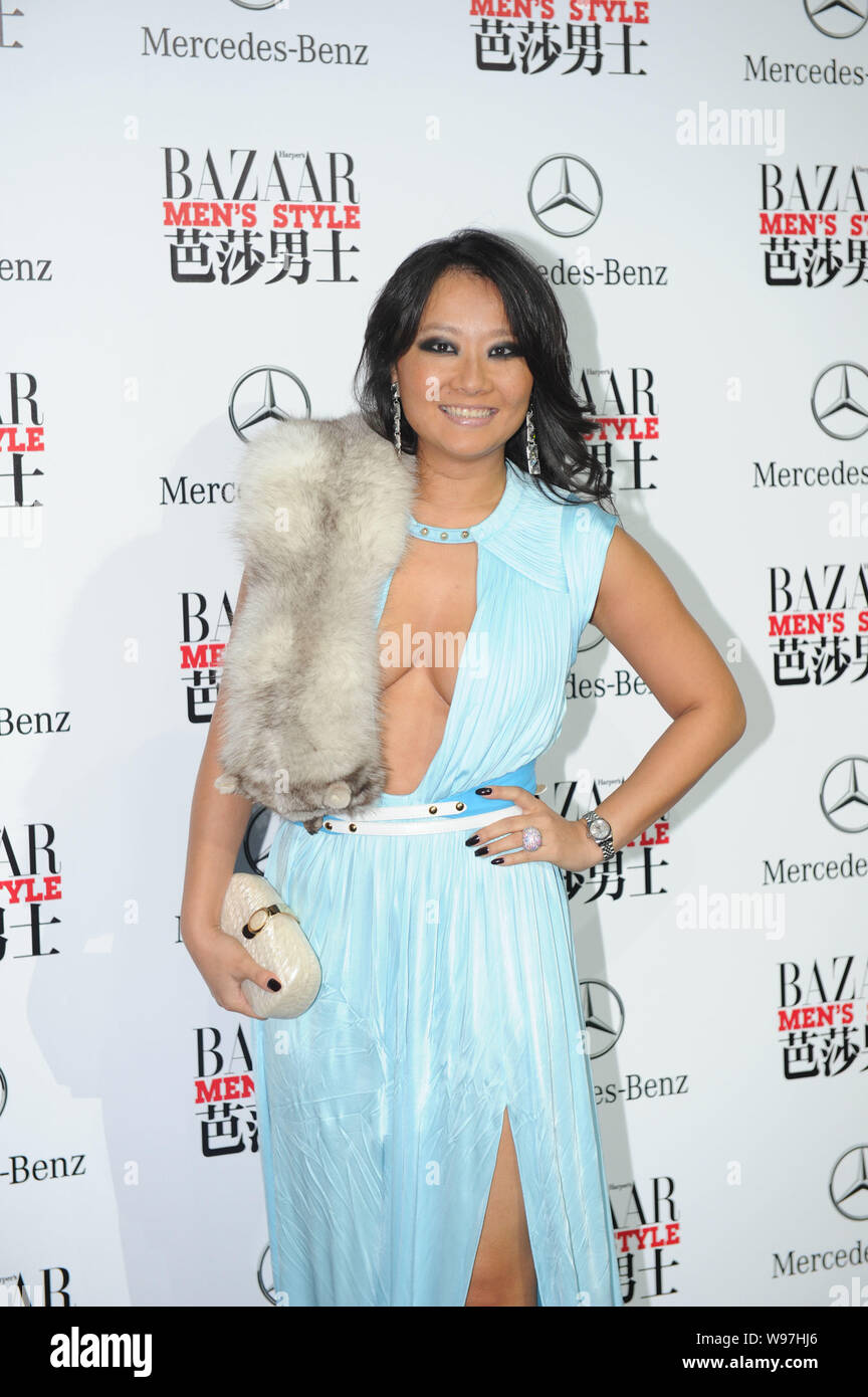 Amanda, styling director of Tony Studio, poses as she arrives for the ...