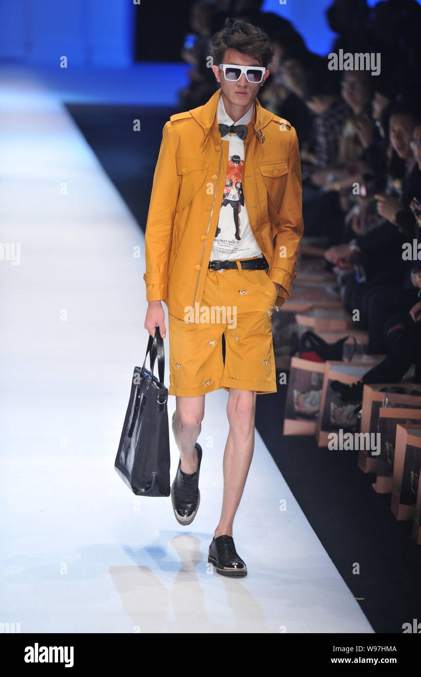 A model displays a new creation by Chinese designer Yuan Bing in the ...