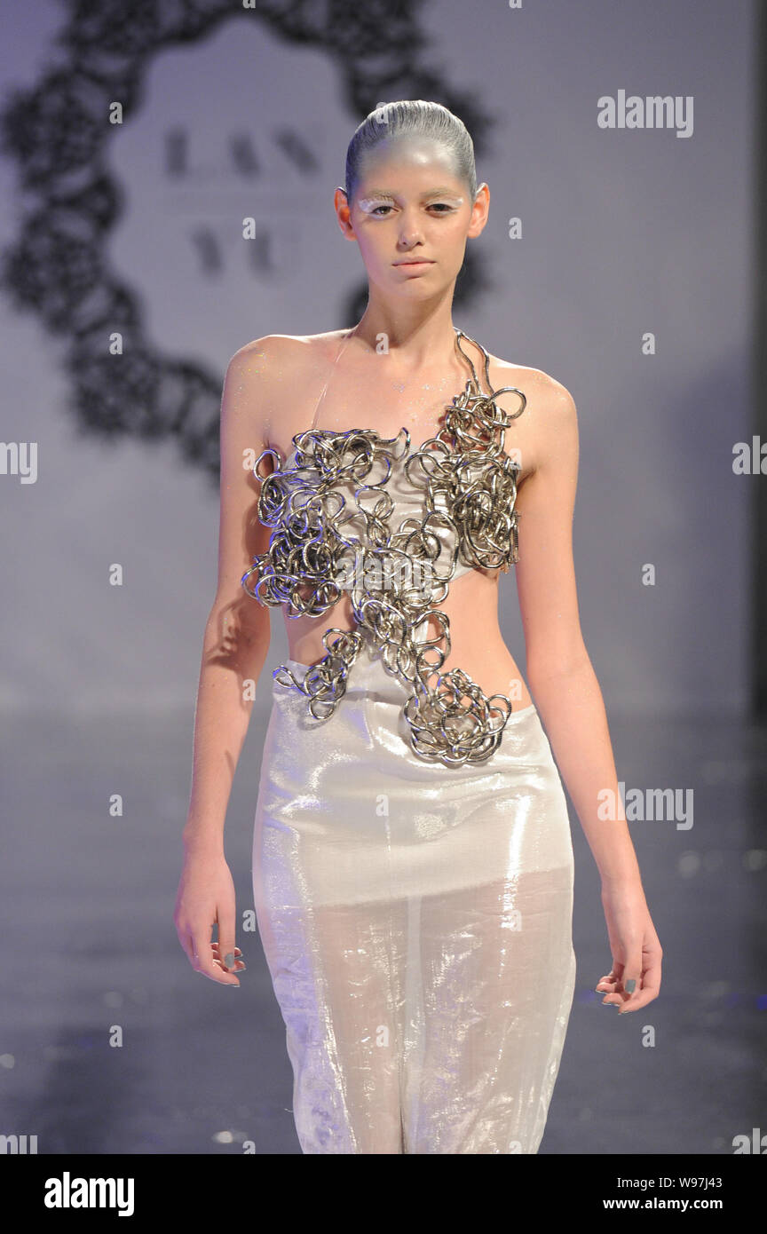 A model displays the new collection during the LAN YU 2013 advanced ...