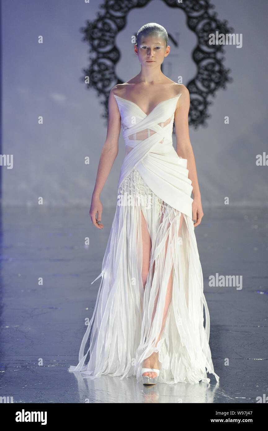A model displays the new collection during the LAN YU 2013 advanced ...