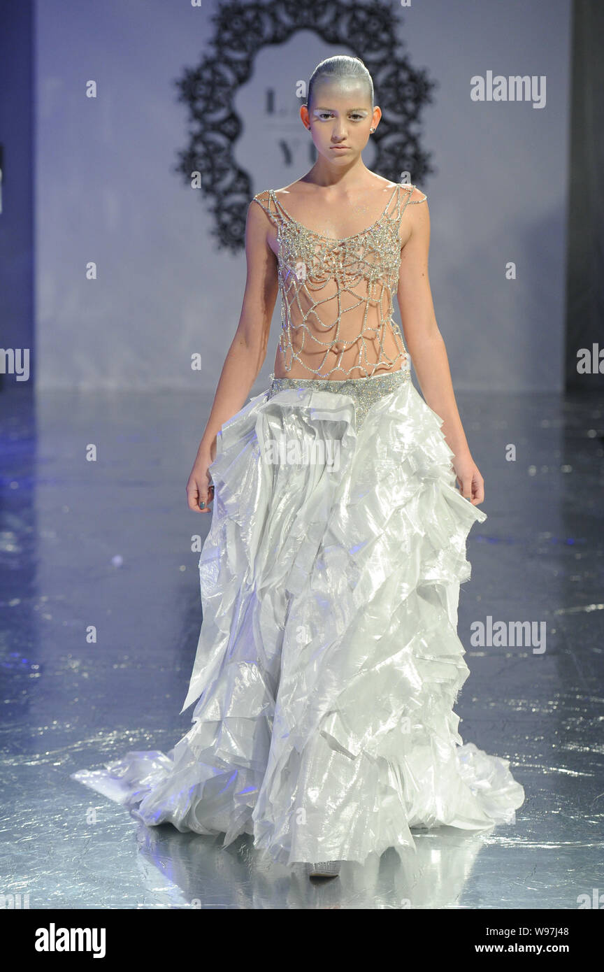 A model displays the new collection during the LAN YU 2013 advanced ...