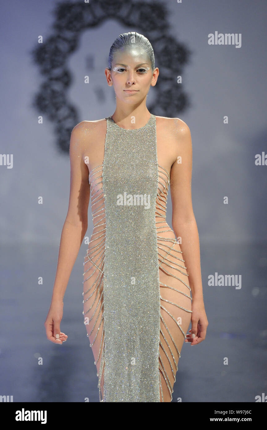 A model displays the new collection during the LAN YU 2013 advanced ...