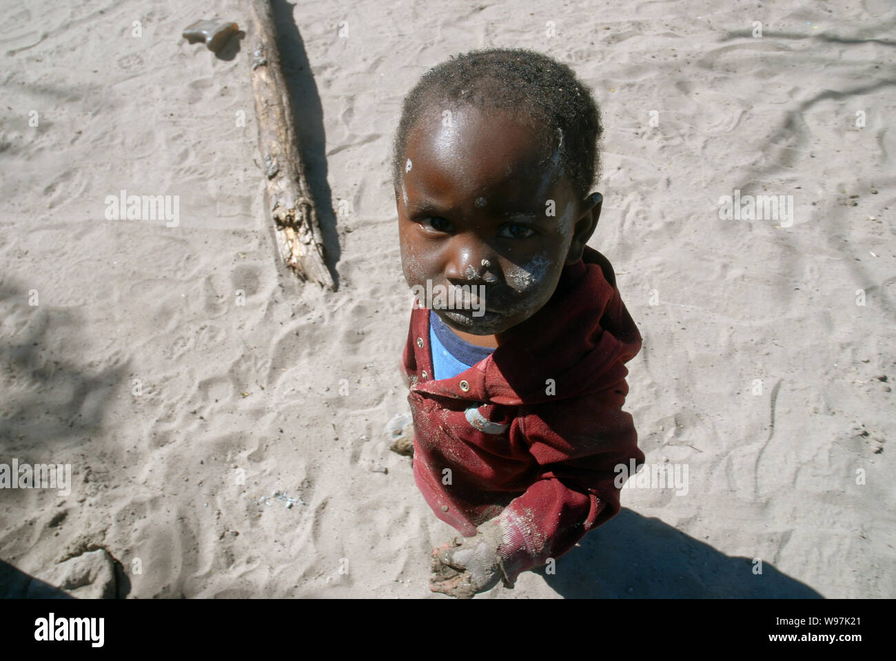 Child mud playing face hi-res stock photography and images - Alamy