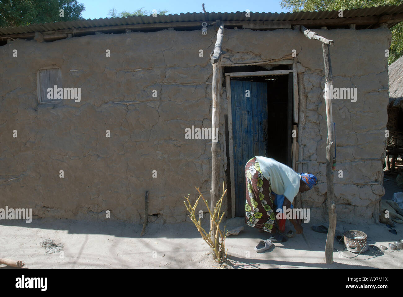 Old lady outside her house, Mwandi, Zambia Stock Photo - Alamy