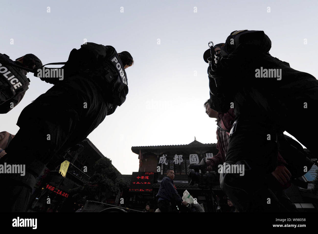 Chinese special policewomen patrol a street in Chengdu city, southwest ...