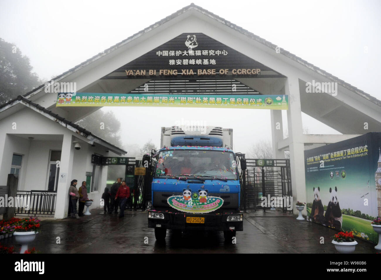 A van carrying giant pandas Yang Guang and Tian Tian leaves the YaAn ...