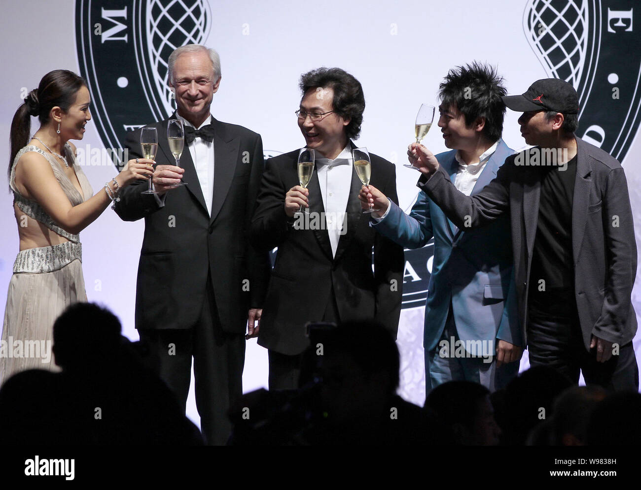 (From left) Chinese actress Gong Li, Lutz Bethge, Managing Director of ...