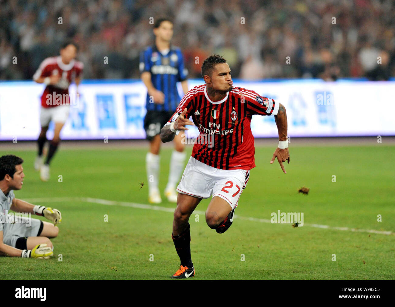 Kevin-Prince Boateng of AC Milan celebrates after scoring against Inter ...