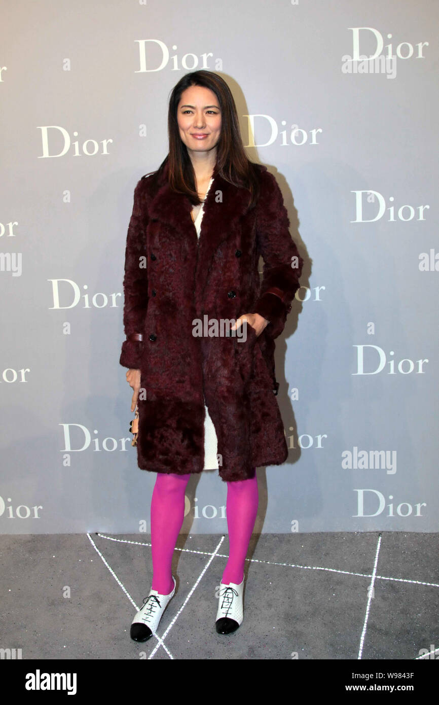 Chinese fashion designer Mary Ma (Ma Yanli) poses at the opening ...