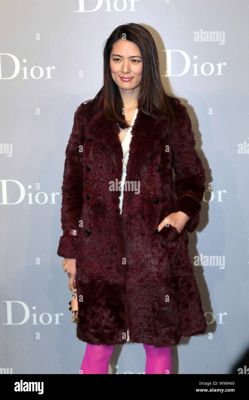 Chinese fashion designer Mary Ma (Ma Yanli) poses at the opening ...