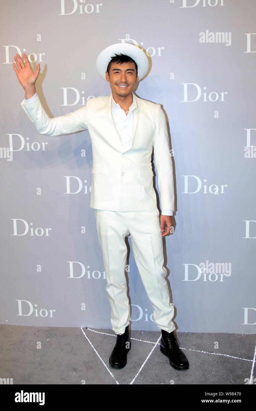 Chinese Actor Hu Bing Poses At The Opening Ceremony Of The Dior Flagship Store At Shin Kong
