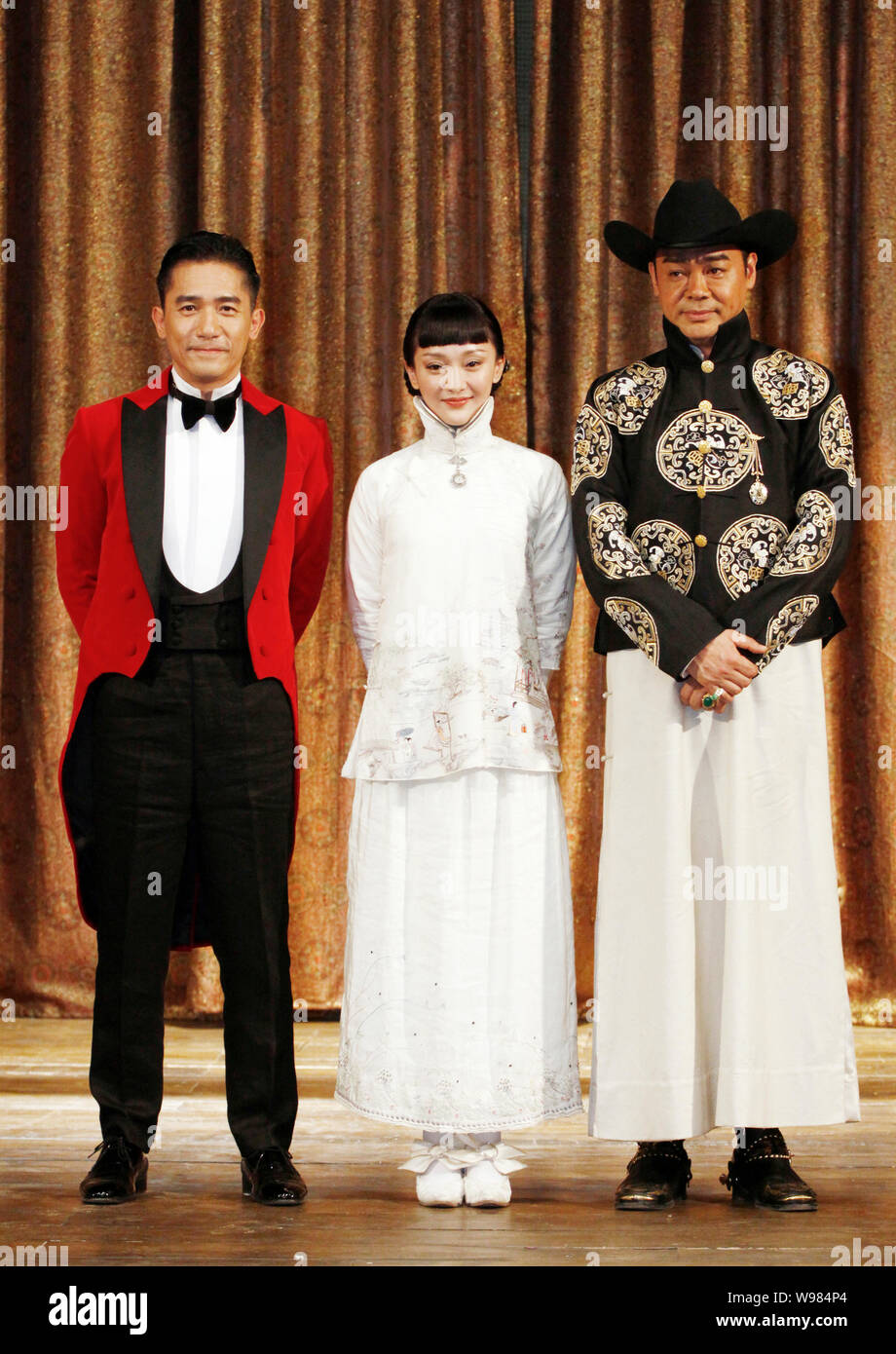 Hong Kong actor Tony Leung Chiu Wai (L), Chinese actress Zhou Xun (C ...