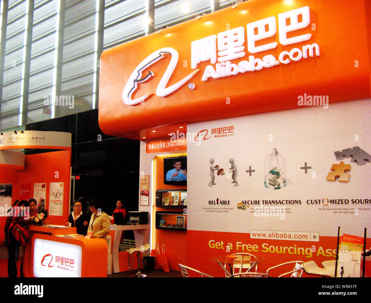 --FILE--People visit the booth of Alibaba during a fair in Shanghai ...