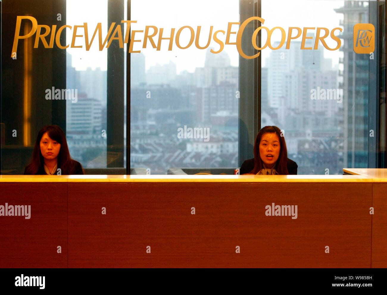 --File--Chinese staff are seen at the reception desk of the China head ...