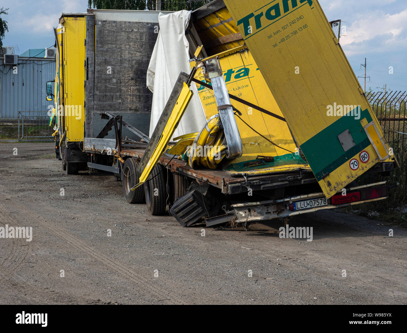 Trailer truck injured in an accident Stock Photo - Alamy