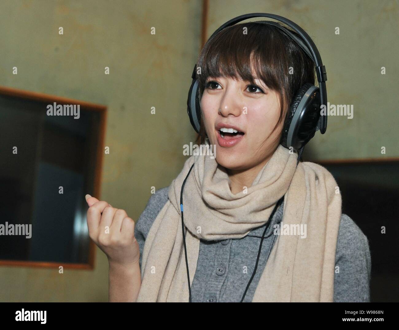 Chinese Tibetan singer Alan dubs for a cartoon movie in Beijing, China ...