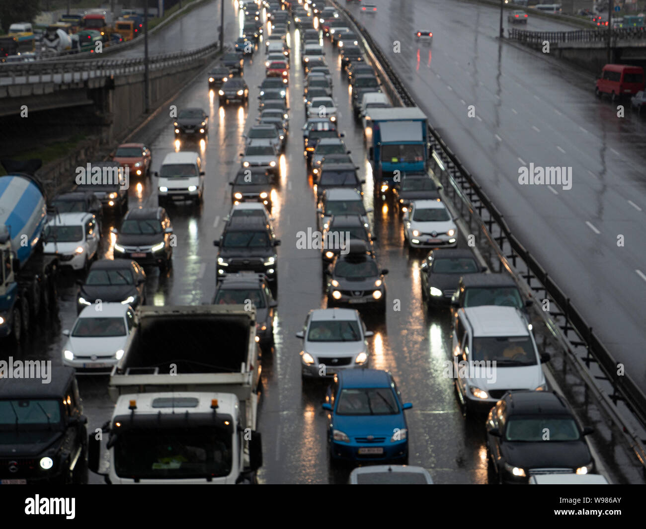 cars standing in traffic jam in the rain Stock Photo - Alamy