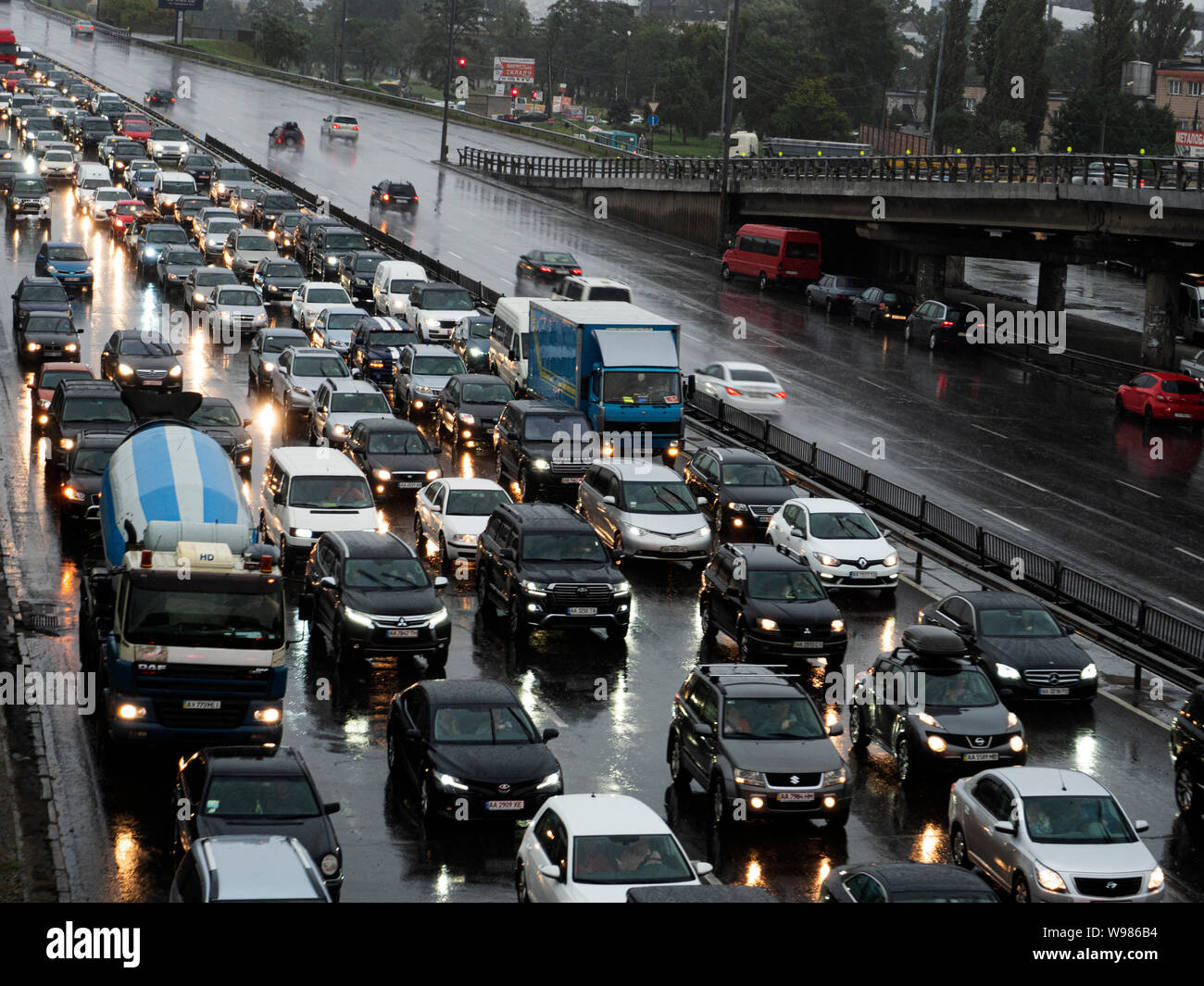 cars standing in traffic jam in the rain Stock Photo - Alamy