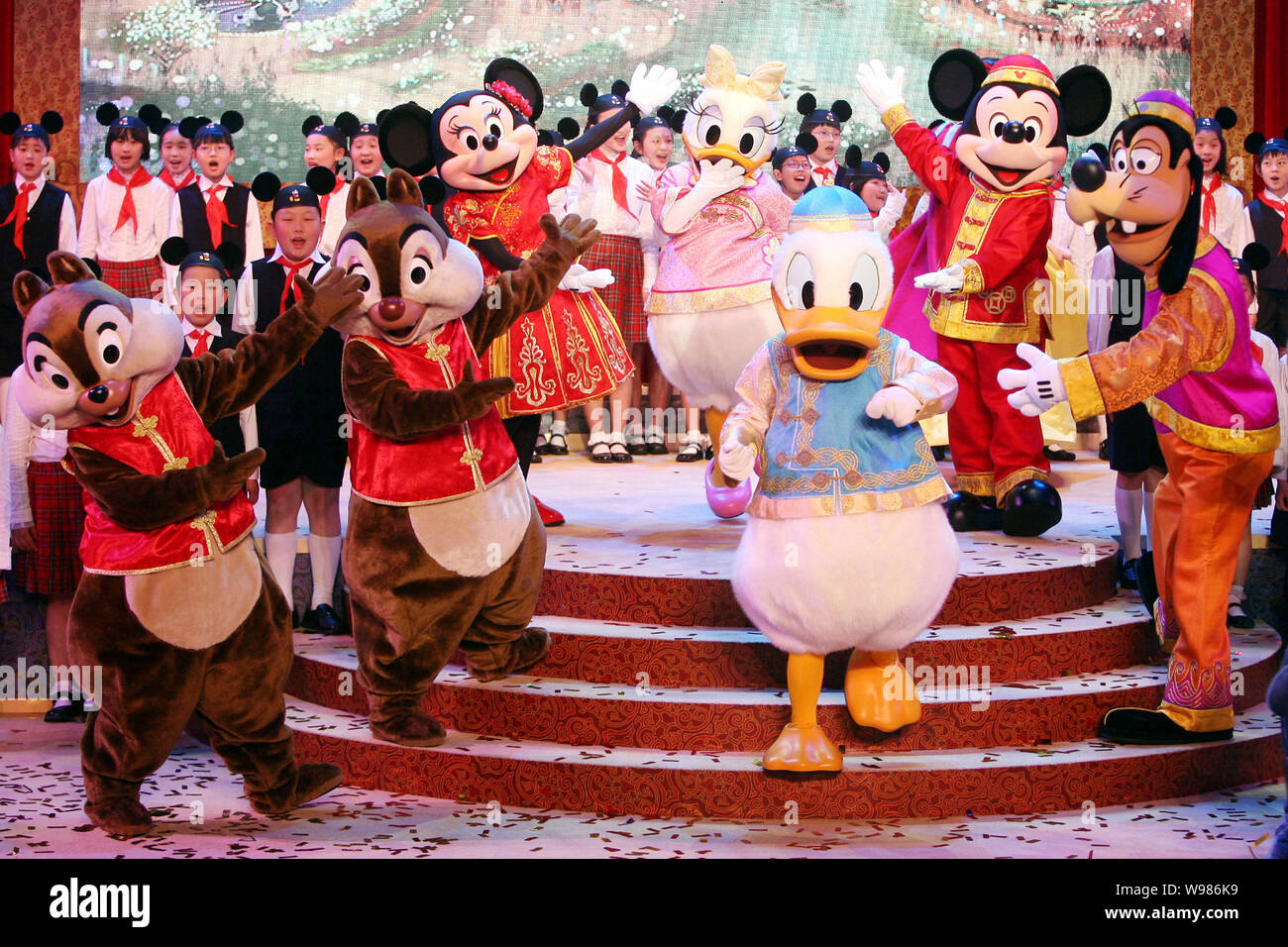 Walt Disney cartoon characters perform at the groundbreaking ceremony ...