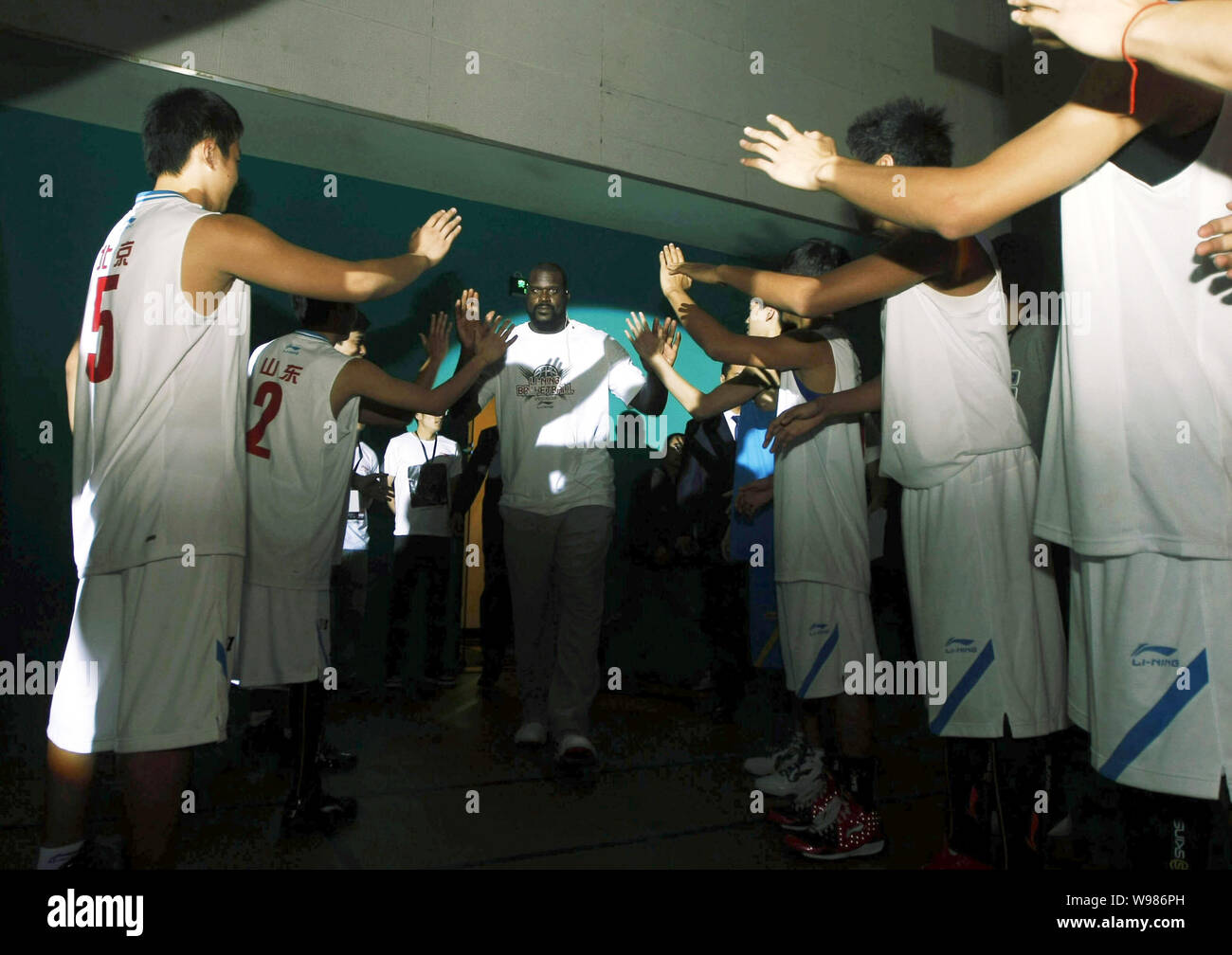 Retired NBA star Shaquille ONeal, center, attends a promotional event ...
