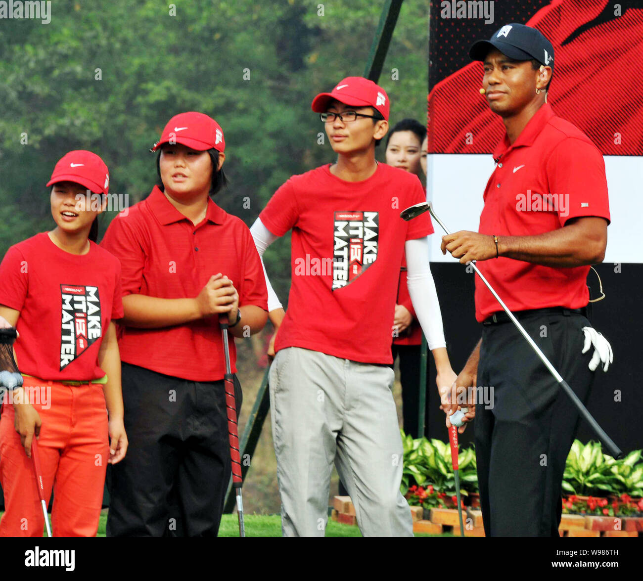 U.S. golf superstar Tiger Woods conducts a golf clinic for junior ...