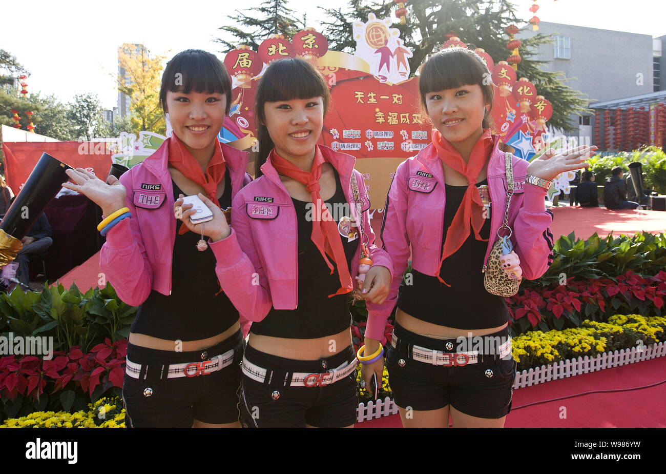 Three Chinese triplet girls attend the 8th Beijing Twins Cultural ...