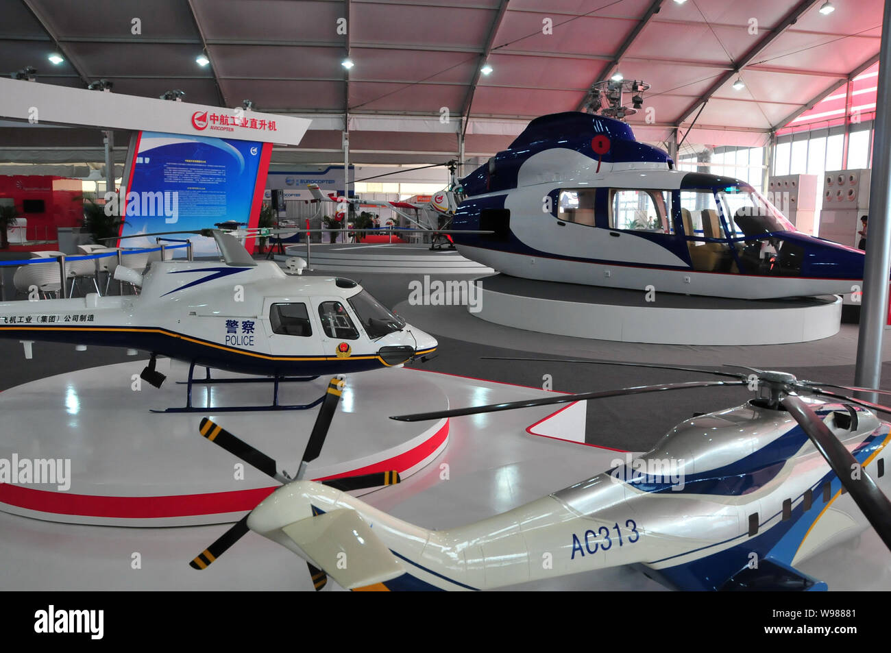 Helicopter models are on display at a stand of Avicopter at the China ...