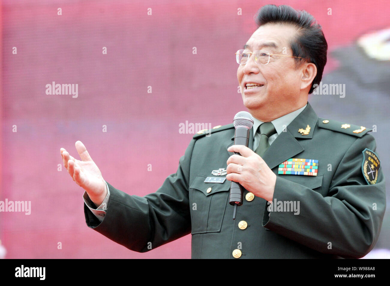 --FILE--Chinese military singer Li Shuangjiang performs during a ...
