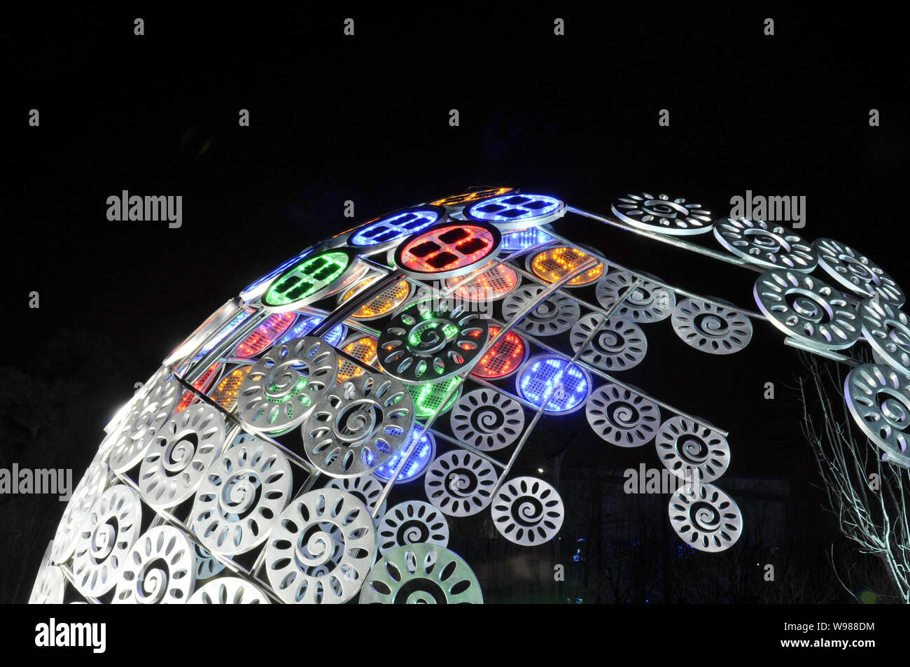 --FILE--Night view of a solar illumination sculpture at a solar ...