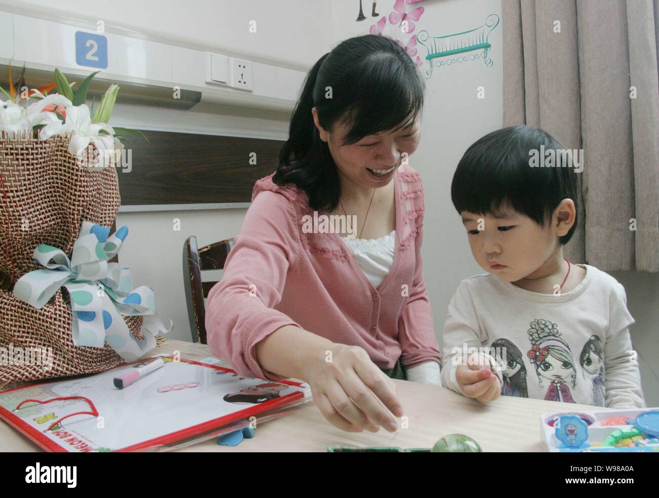 Zhang Fangyu (R), also known as Niu Niu, and Wu Juping who rescued the ...