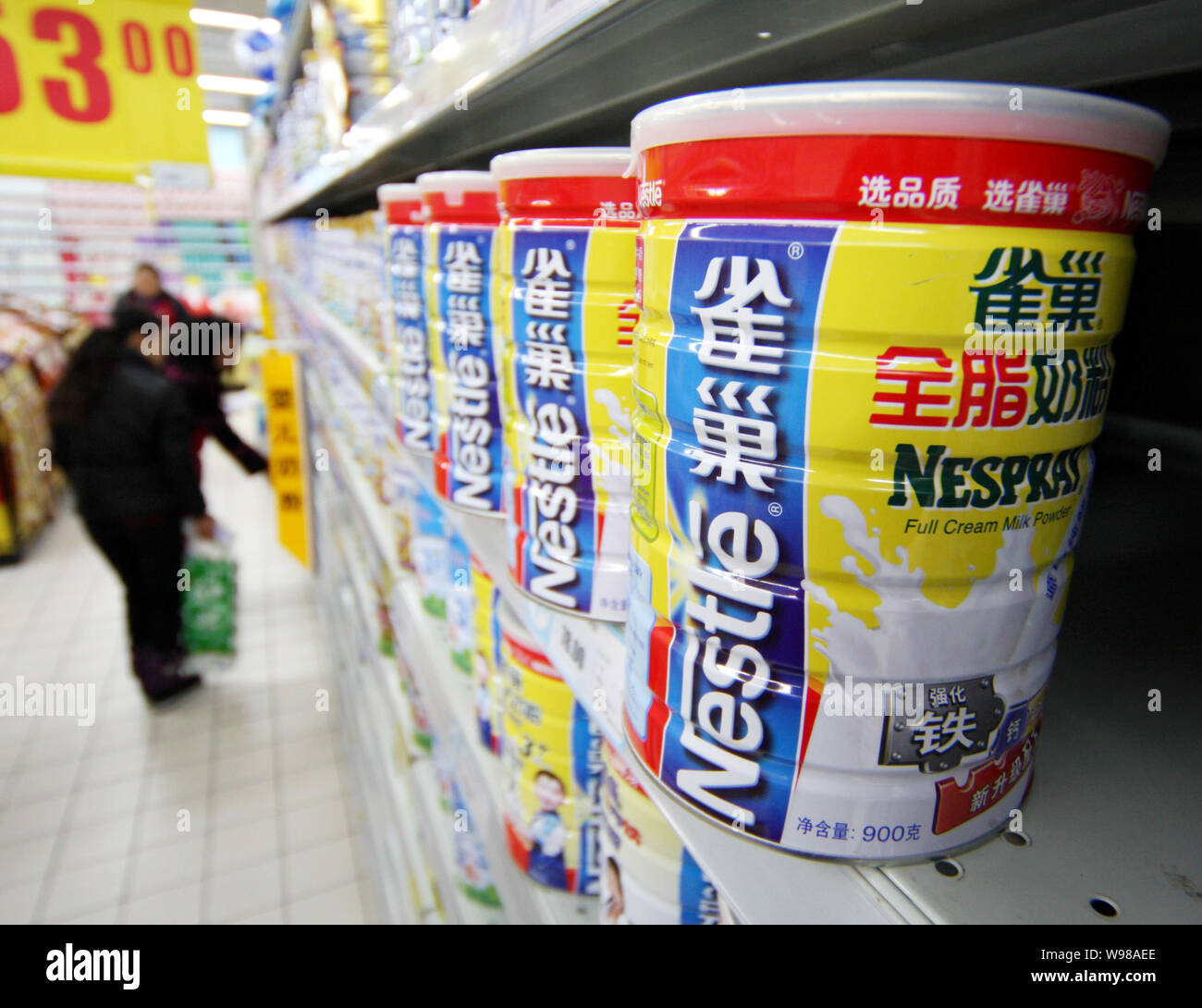 --FILE--Tins of Nestle milk powder are for sale at a supermarket in ...