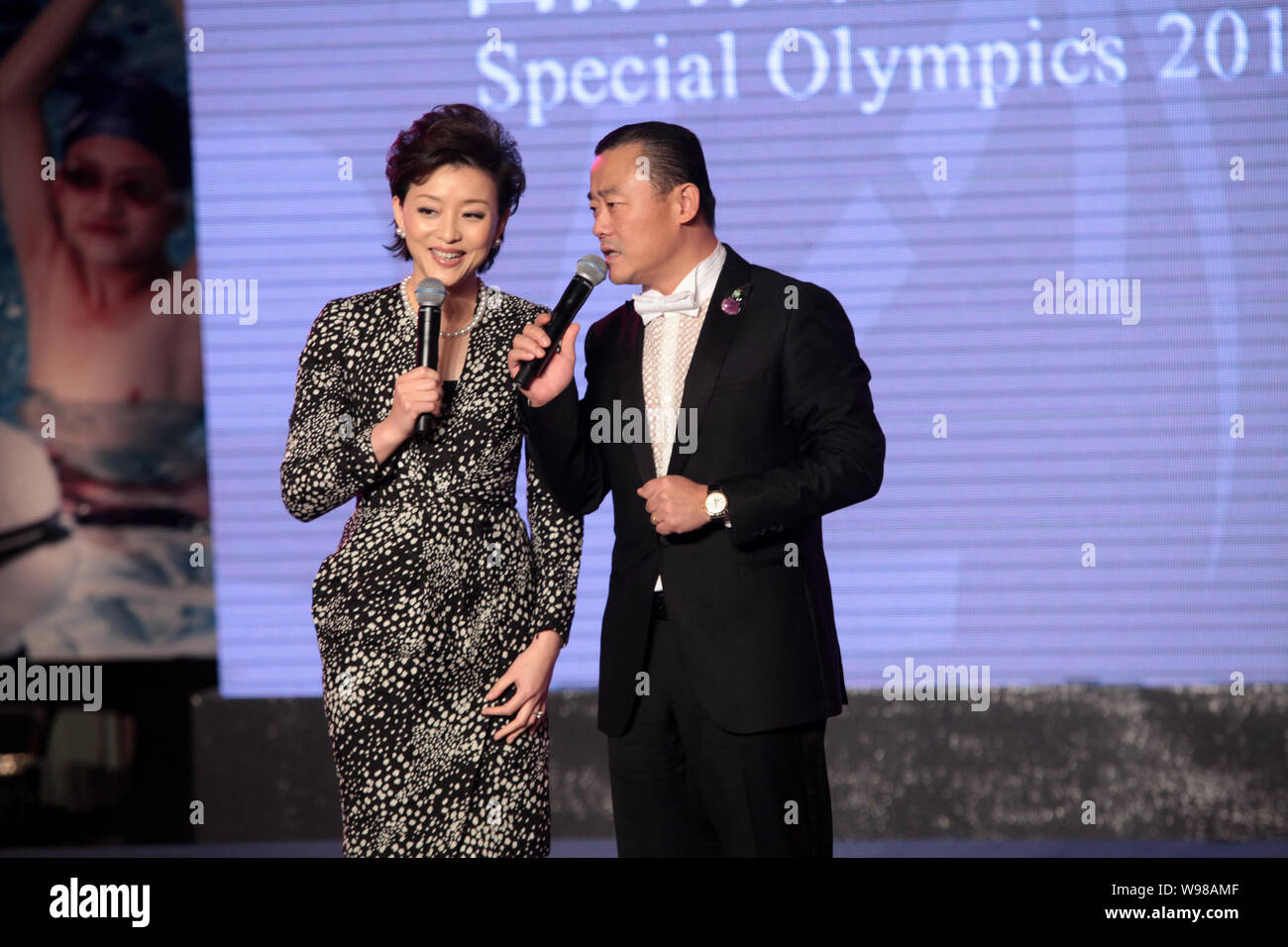 Chinese TV hostess Yang Lan and Shanghai comedian Zhou Libo attend a ...