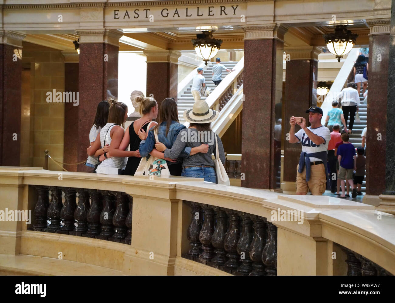 Wisconsin State Capitol, Madison, WI USA. Aug 2018. Friends posing for ...