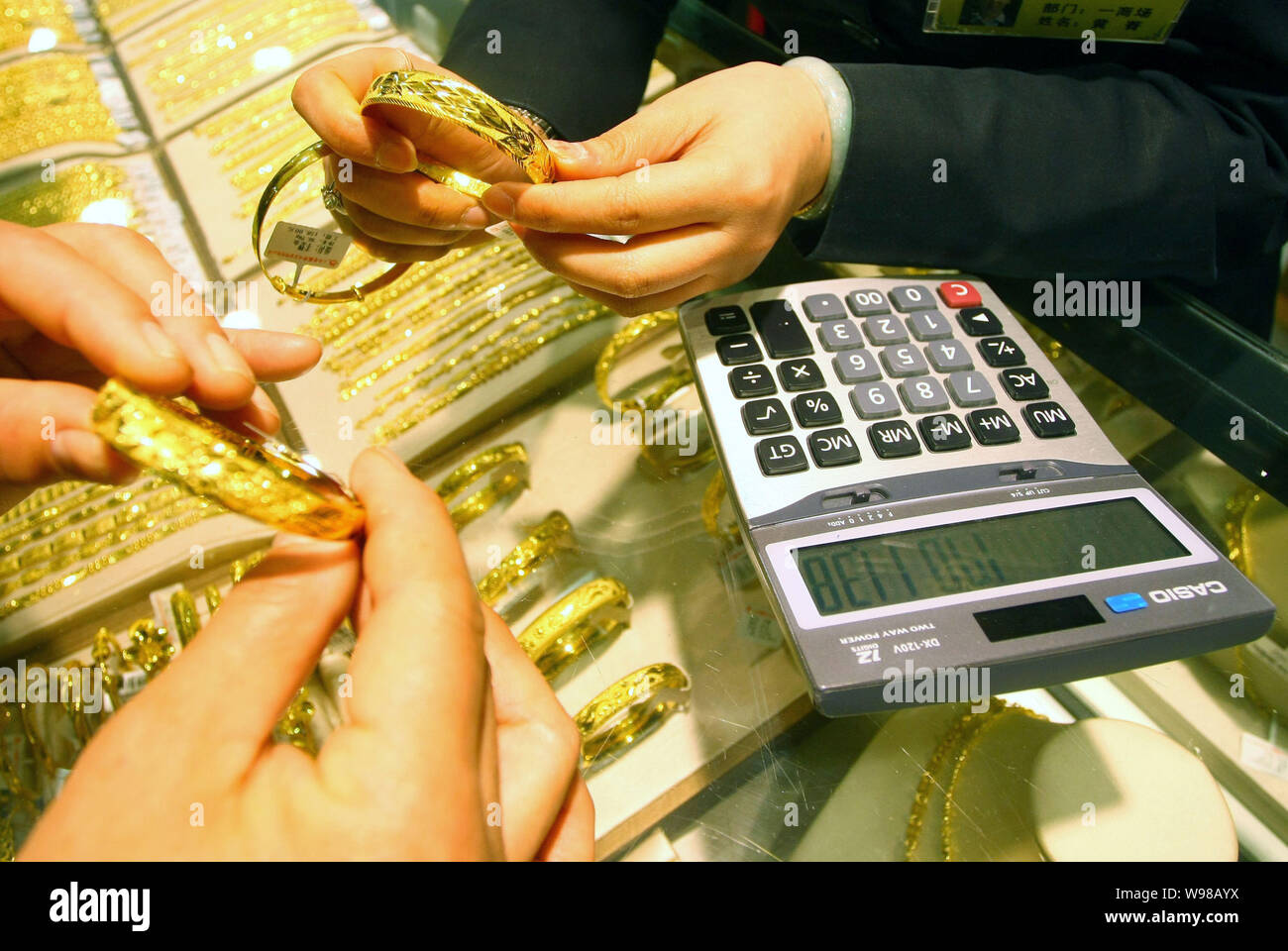 Buys gold hi-res stock photography and images - Alamy
