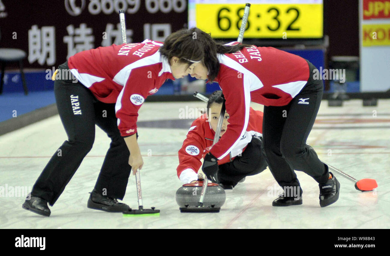 Players of Japan compete in a womens double round-robin match against ...