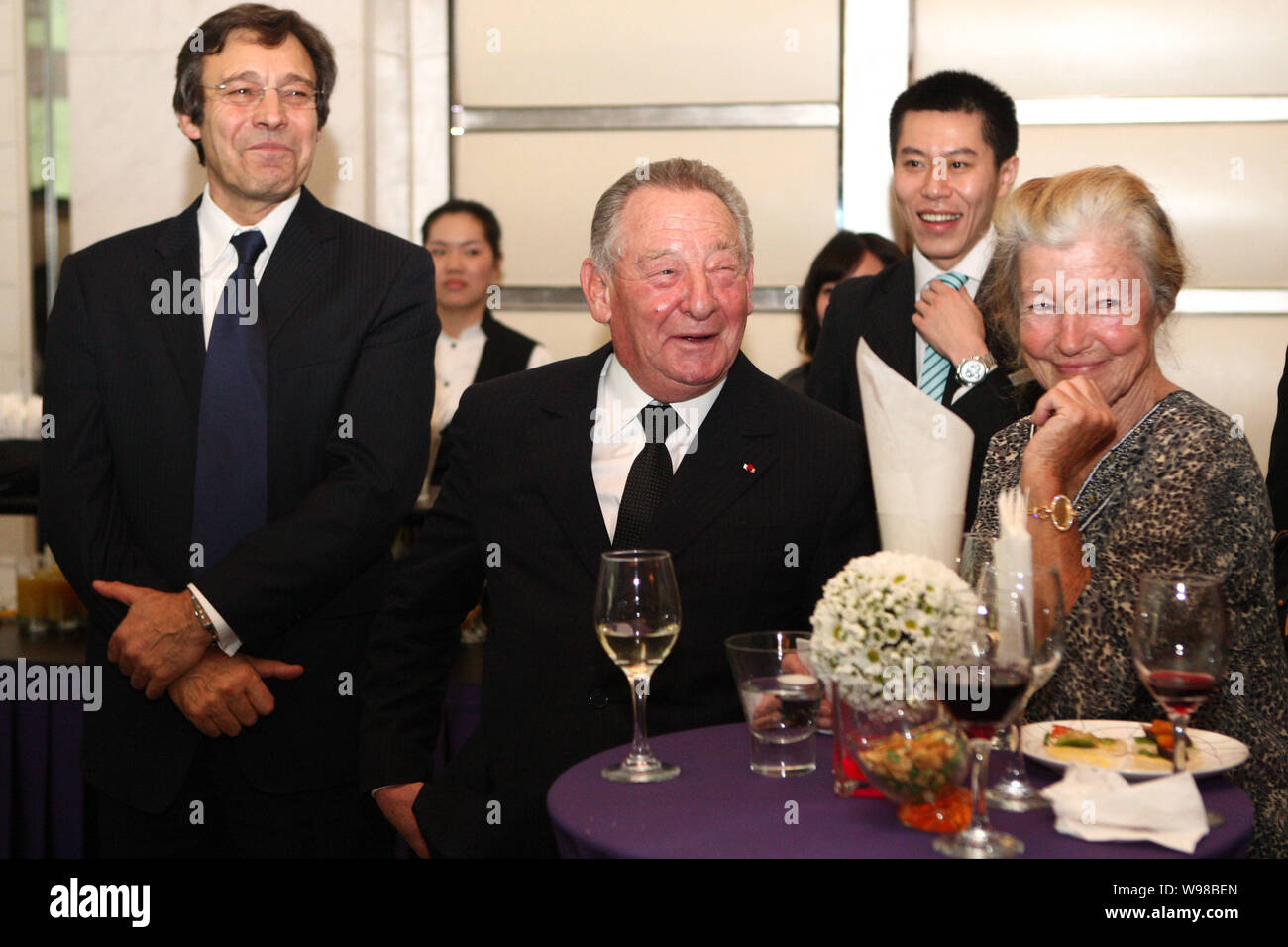 Accor co-founder Gerard Pelisson (C) is pictured during the 1st ...