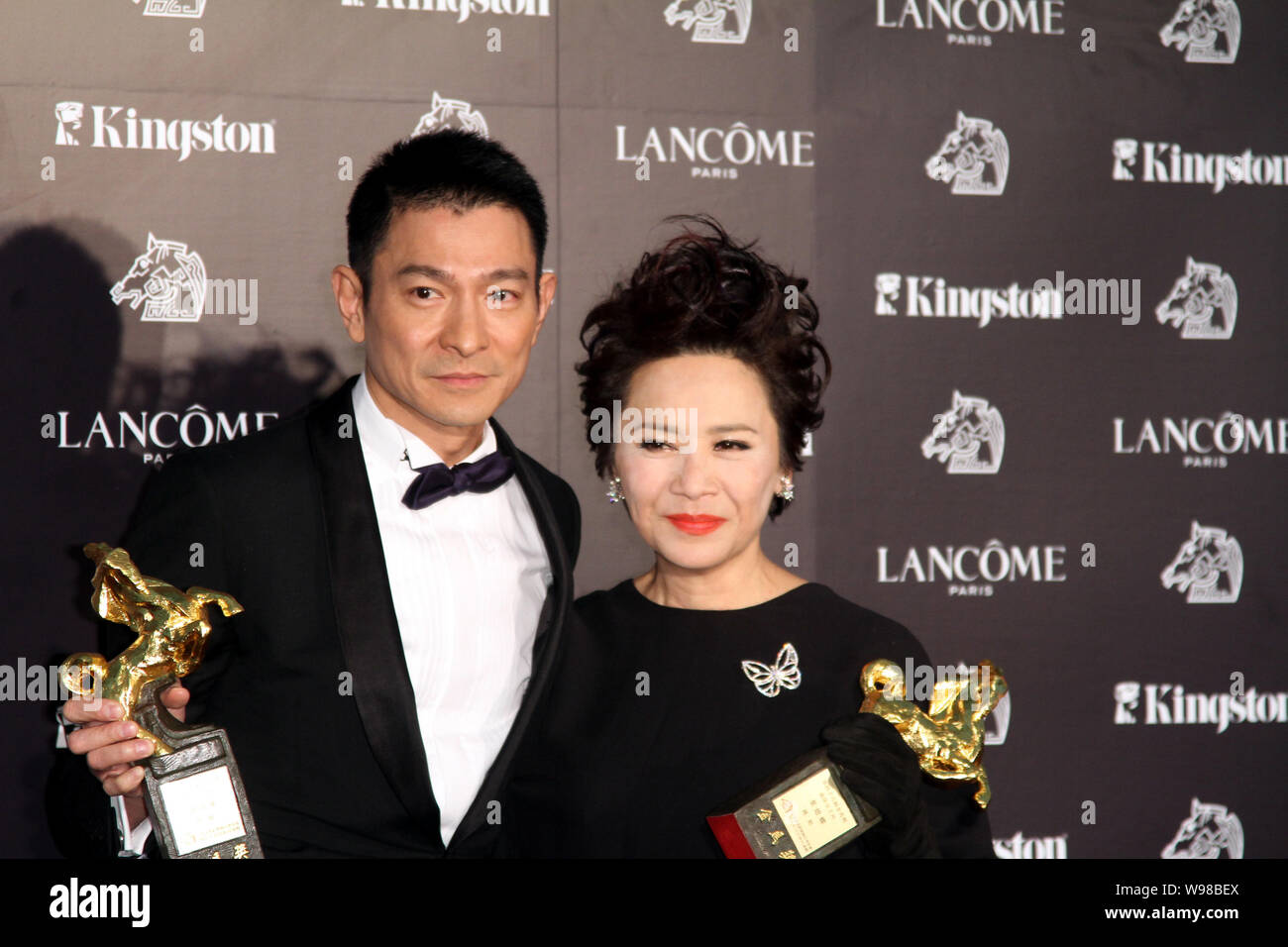 Hong Kong singer and actor Andy Lau and Hong Kong actress Deannie Yip ...