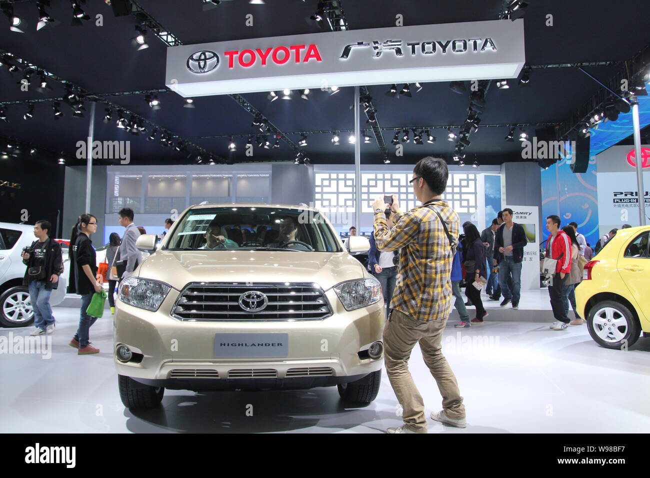--File--Visitors are seen at the stand of Toyota during an auto show in ...