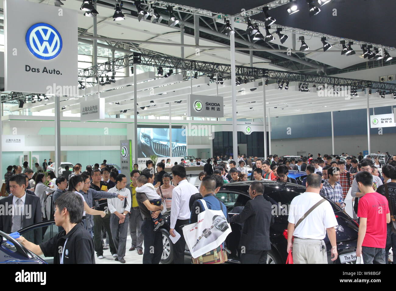 --File--Visitors are seen at the stand of Shanghai Volkswagen during an ...