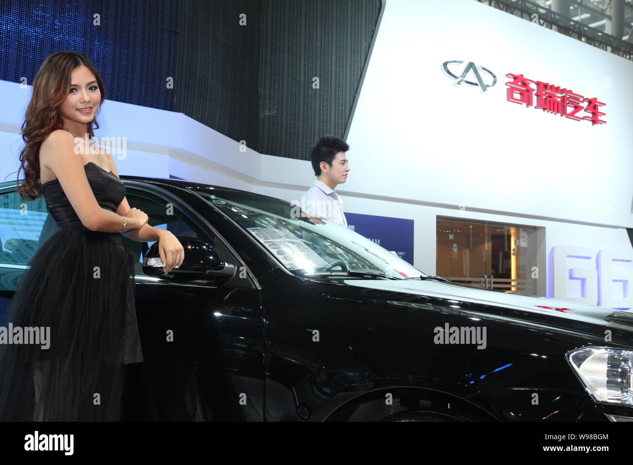 --File--Models pose at the stand of Chery during an auto show in ...