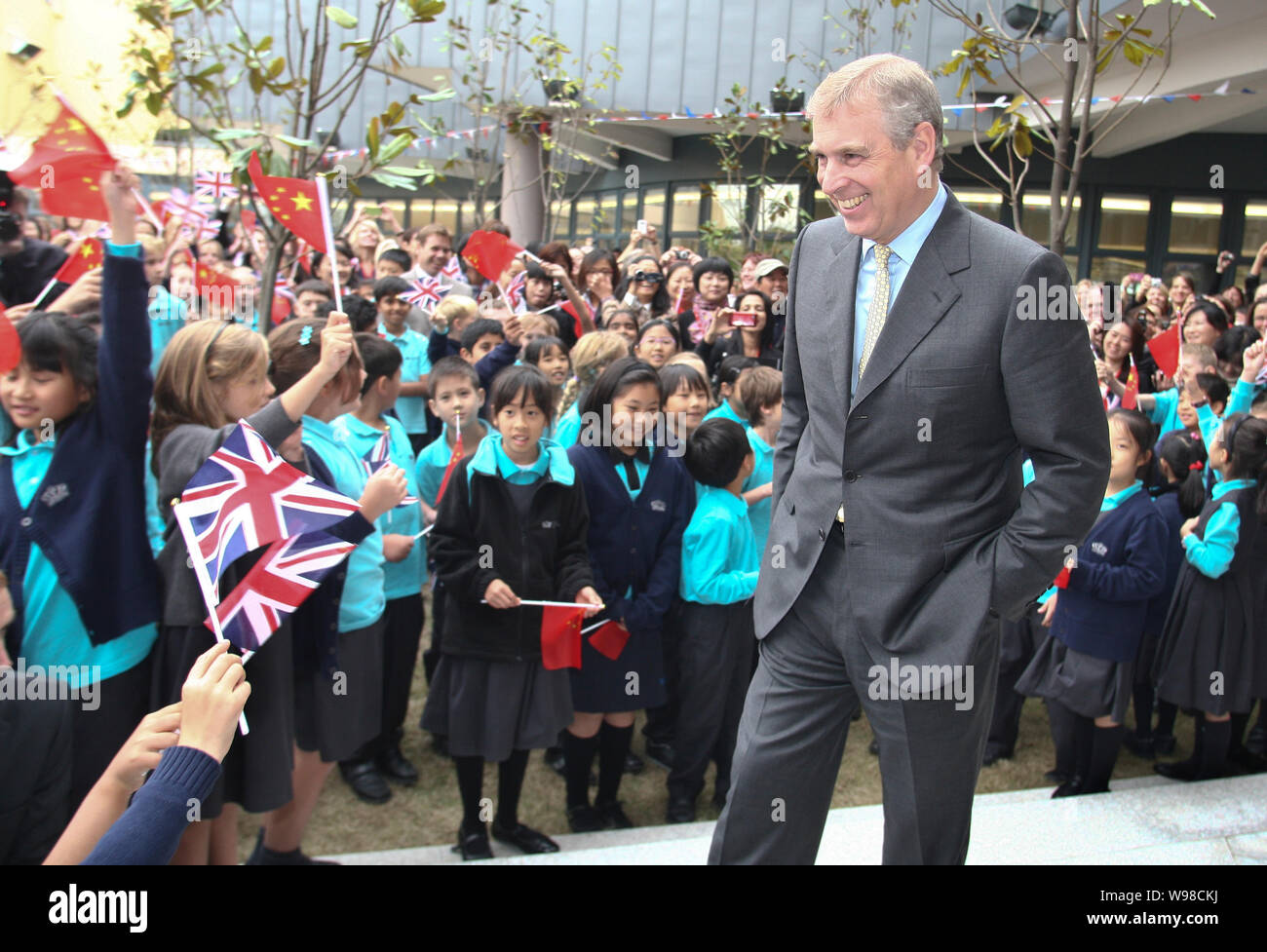 Prince Andrew of Britain smiles at Shanghai British School in Shanghai ...