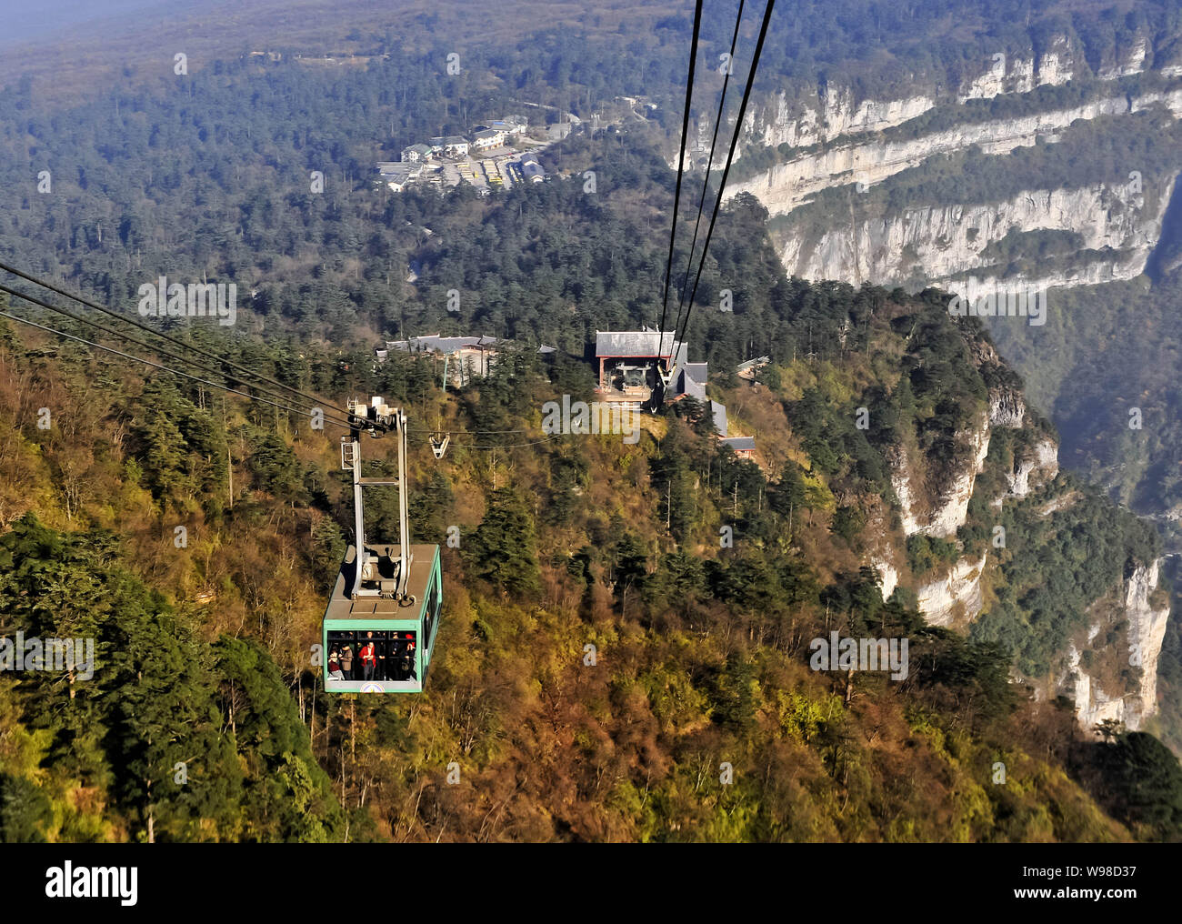 --File--Tourists take a cable car to go up the Mount Emei, is shown at ...