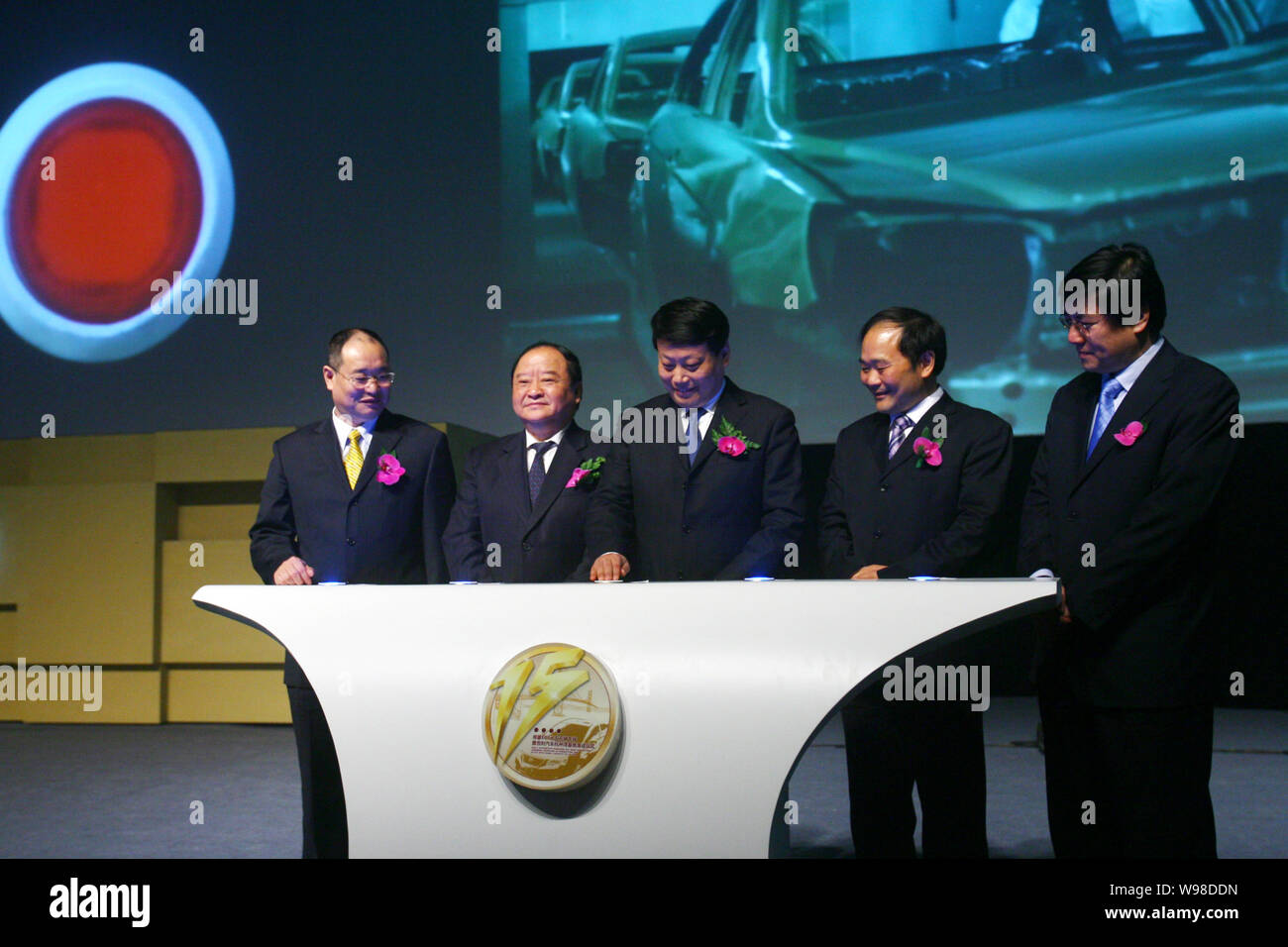 (From left) Yang Jian, President of Geely Holding Group, Zhang Xiaoyu ...