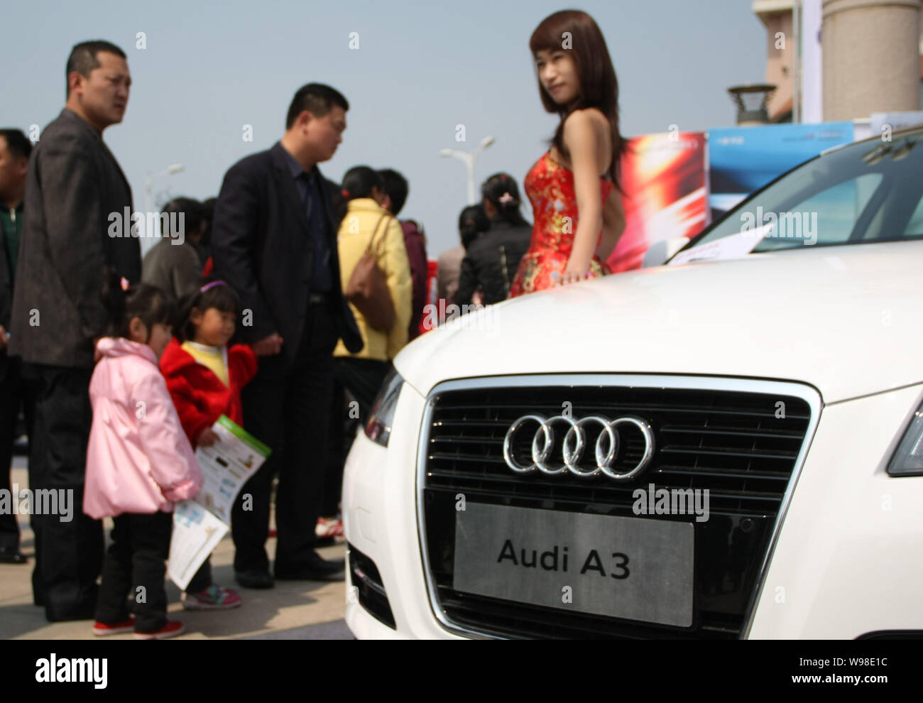--File--Residents visit a stand of Audi, Volkswagens premium car brand ...
