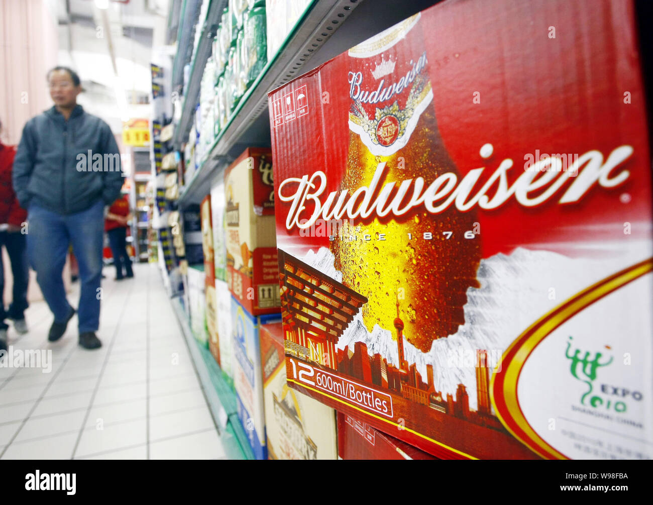 --FILE--Bottles of Budweiser beer are for sale on the shelf at a ...