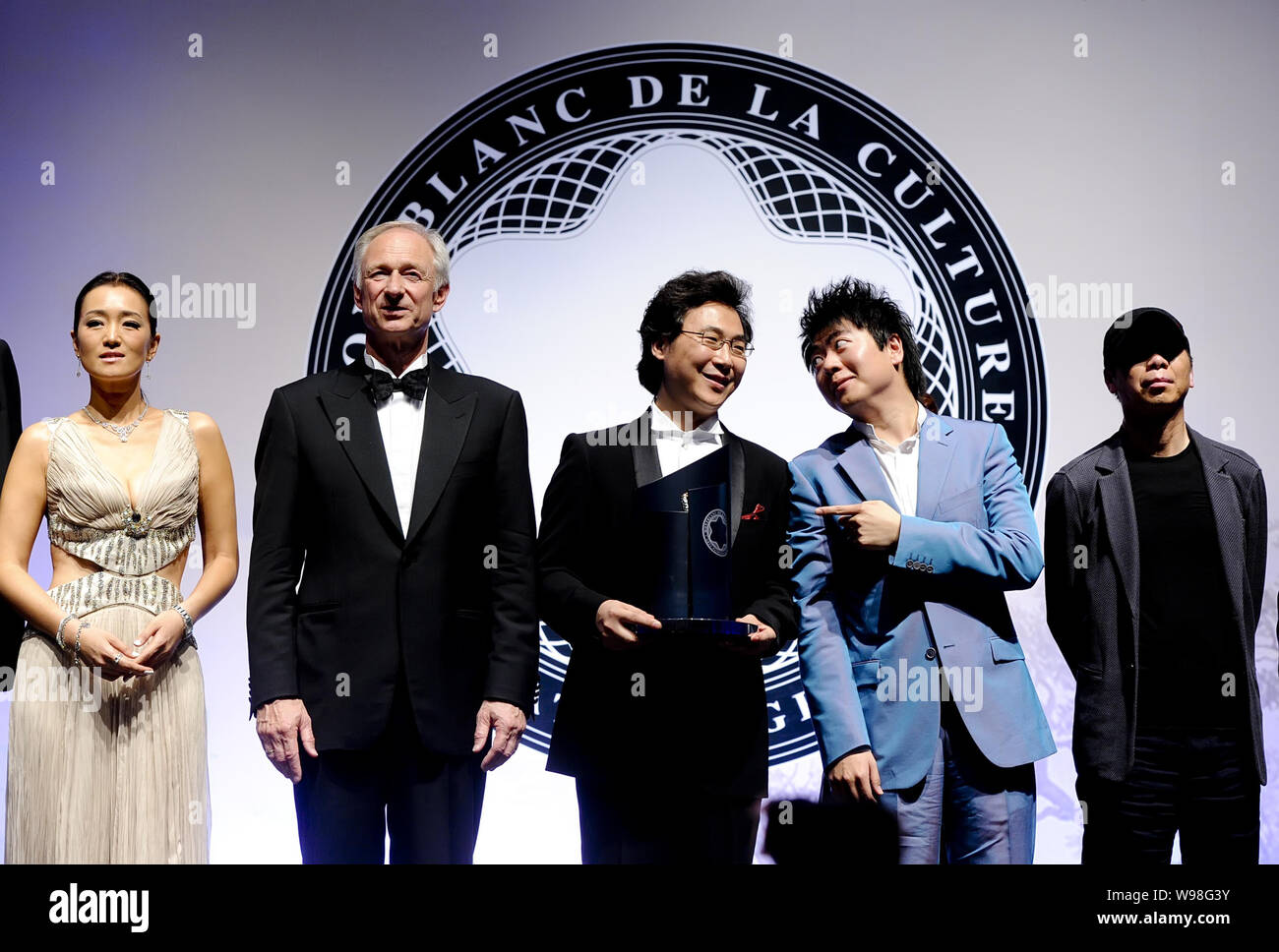 (From left) Chinese actress Gong Li, Lutz Bethge, Managing Director of ...