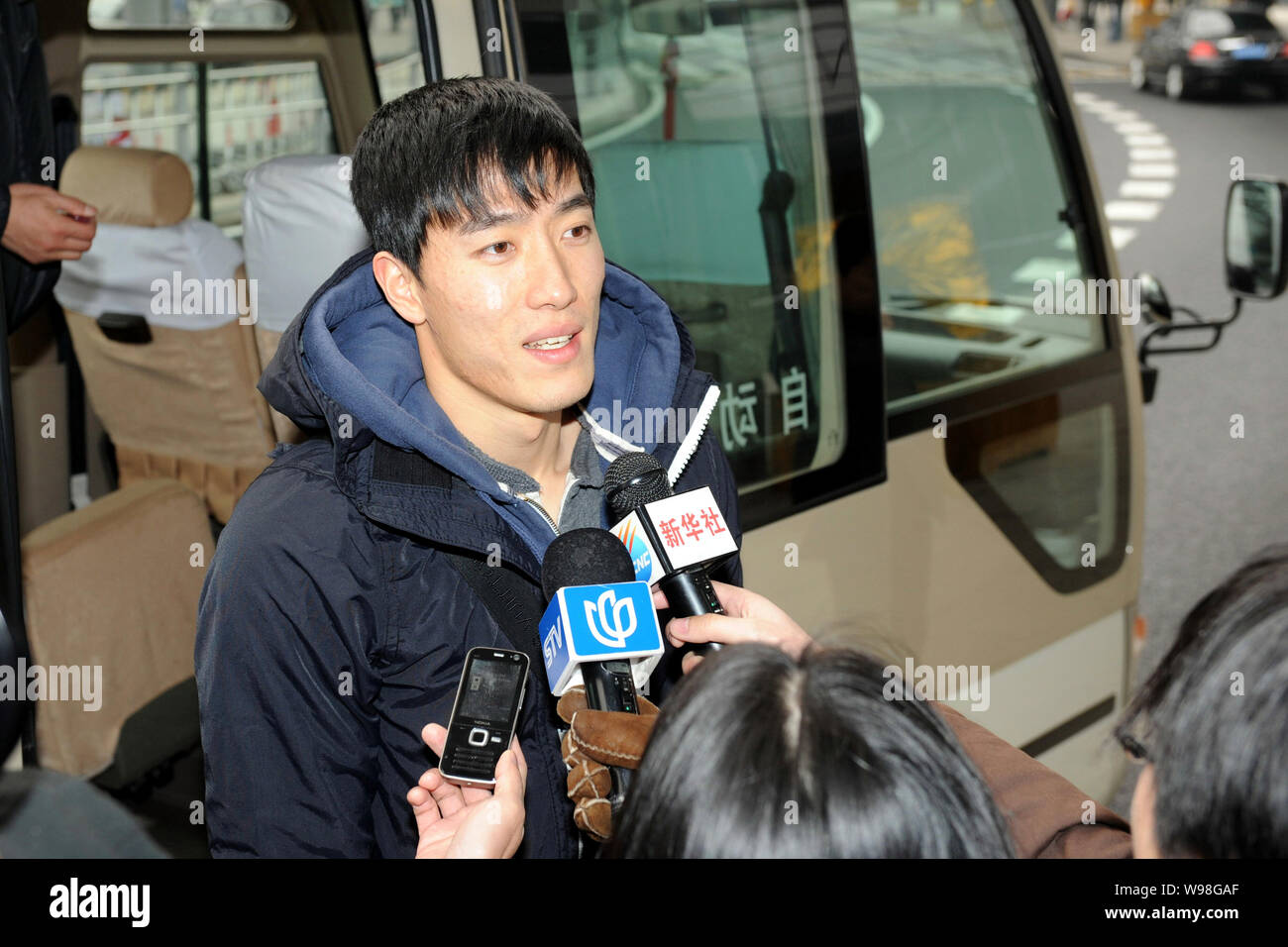 Chinese star hurdler Liu Xiang is interviewed at the Shanghai Hongqiao ...