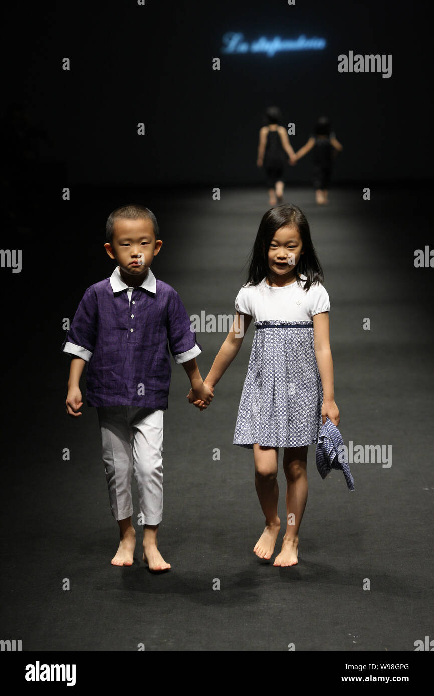 Child models pose in La stupenderia fashion show during the Shanghai ...