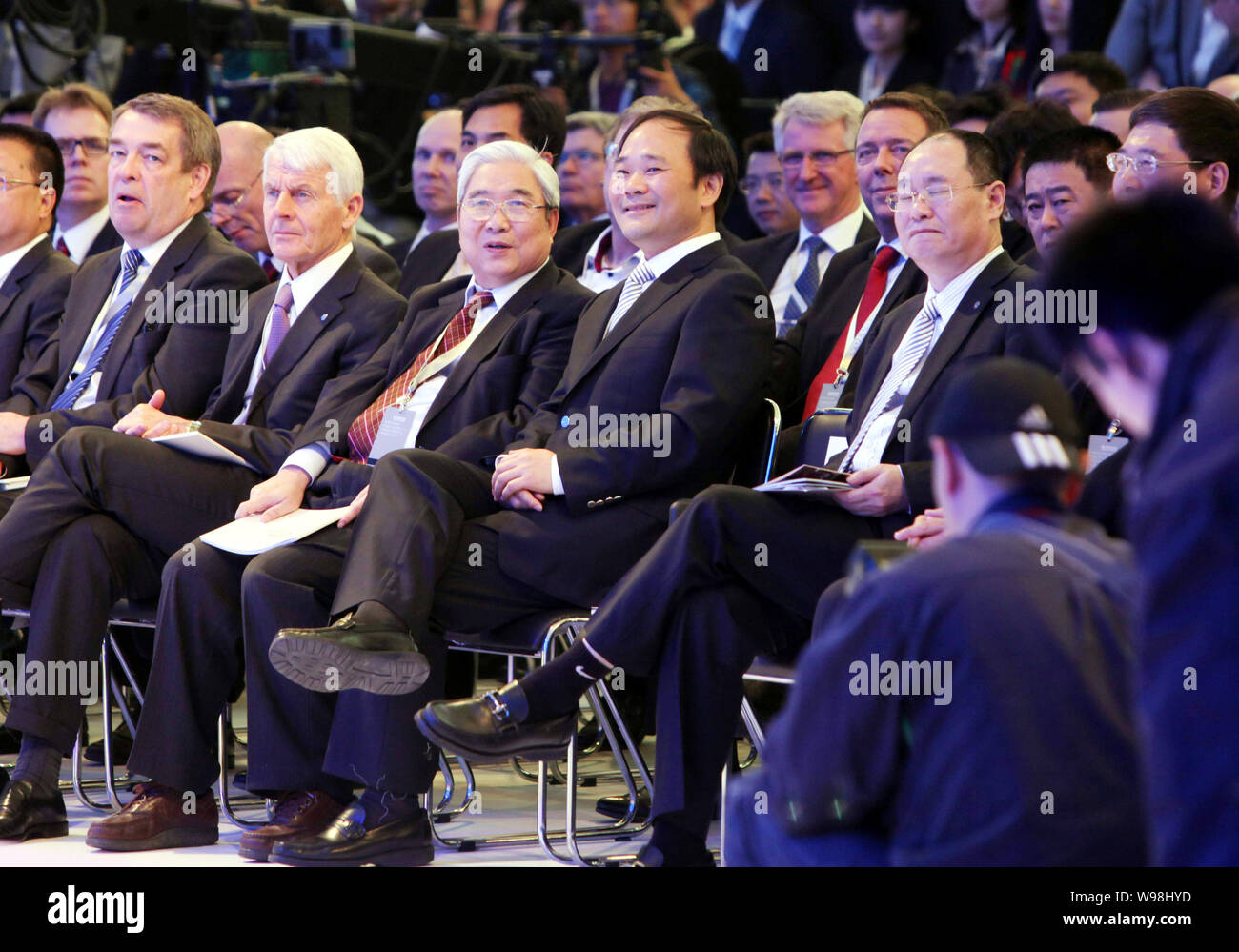Li Shufu, center, Chairman of Geely Holding Group, is pictured at the ...